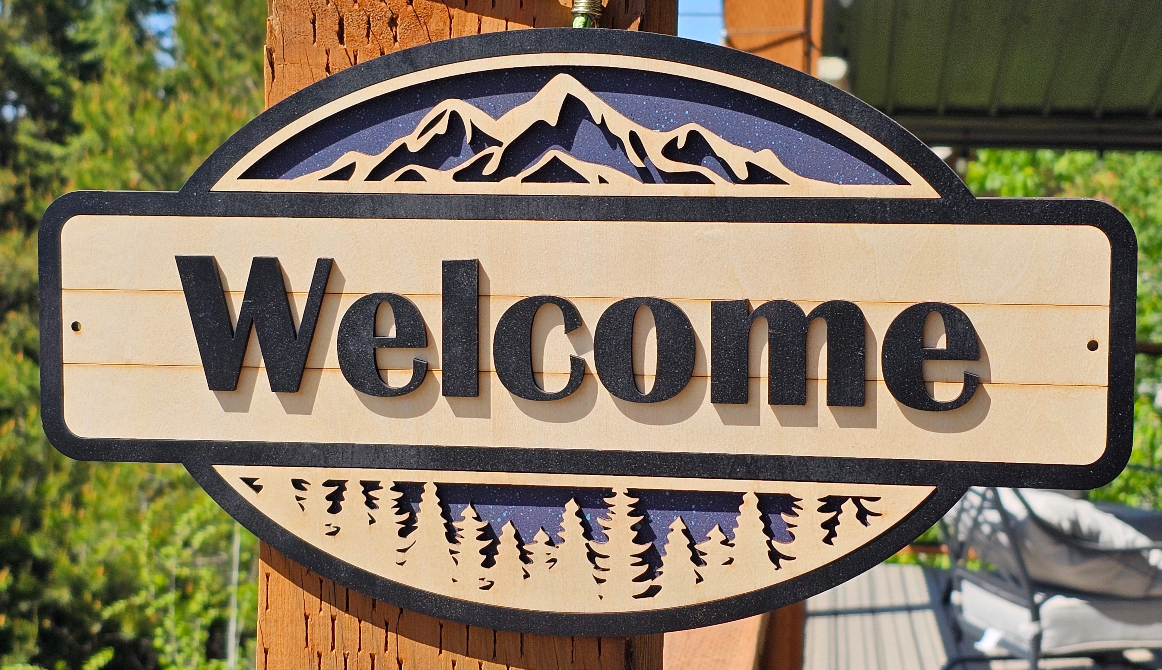 Rustic Welcome Sign with Trees & Mountains – Bandit Laser